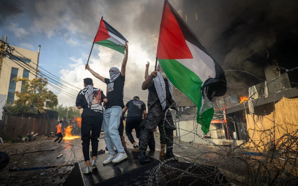 In photos: Pro-Palestinian protests turn violent outside of US Embassy ...
